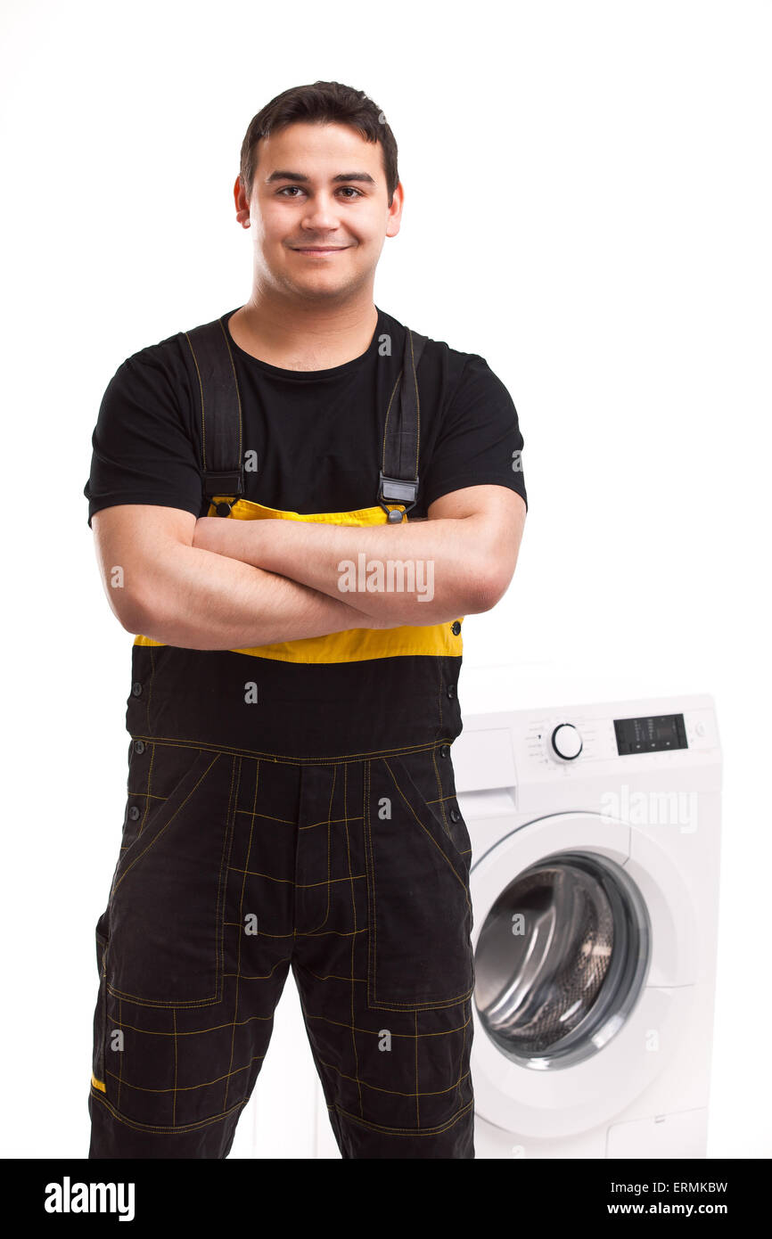 studio photo of washing machine repairman Stock Photo - Alamy