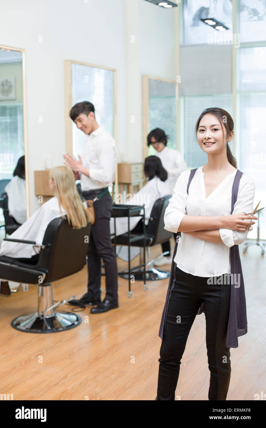 Barbers working in barber shop hi-res stock photography and images - Alamy