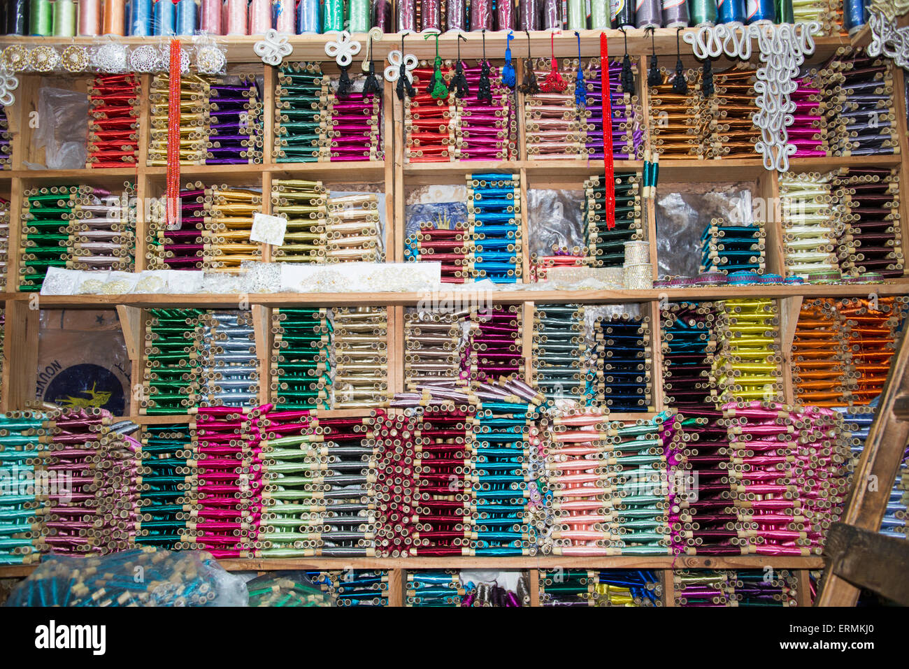 Attractive display of threads in local store; Chefchaouen, Morocco ...