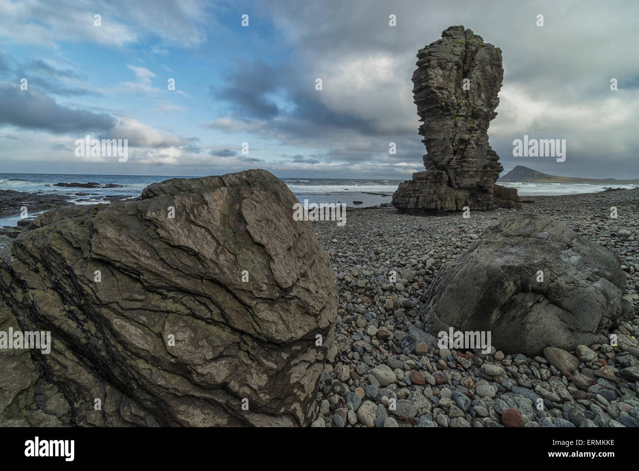 Sea stacks rise above the shoreline along the Strandir Coast in the ...