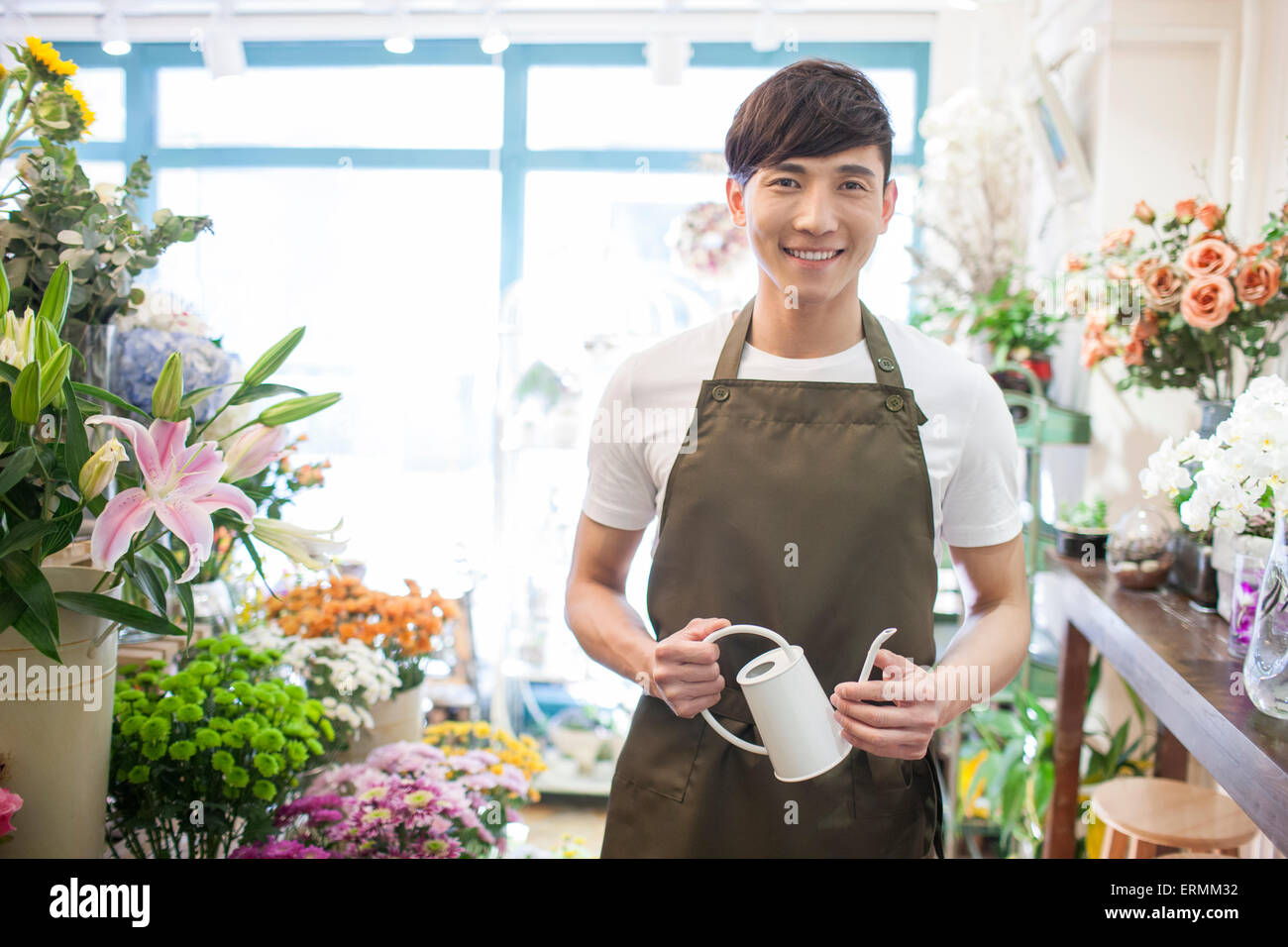 Professional male florist in hi-res stock photography and images - Alamy