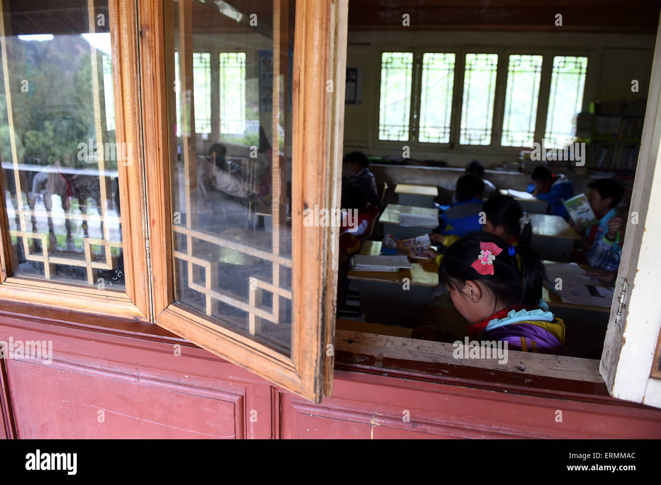 Yulong, China's Yunnan Province. 4th June, 2015. Pupils have class at ...