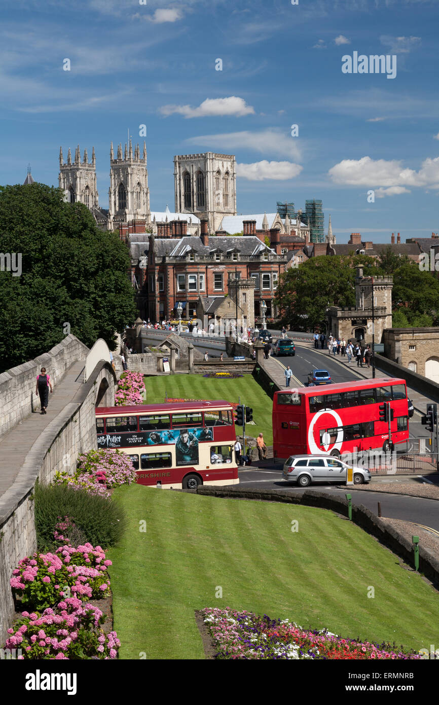York Minster, the Bar Walls and double decker buses crossing Lendal ...