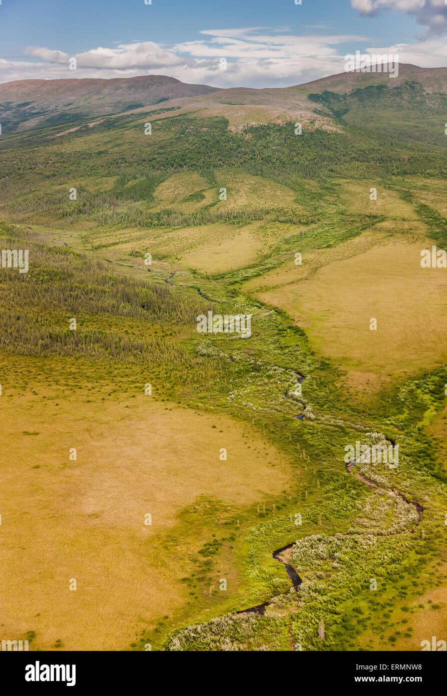 Aerial view of the Baird Mountains, meandering stream and tundra ...