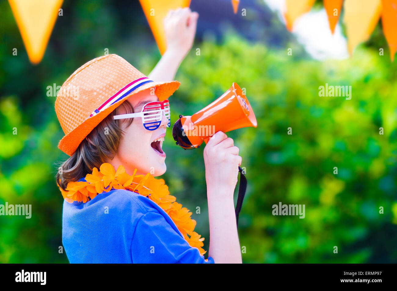 Dutch boy, football fan, cheering and supporting soccer team of ...