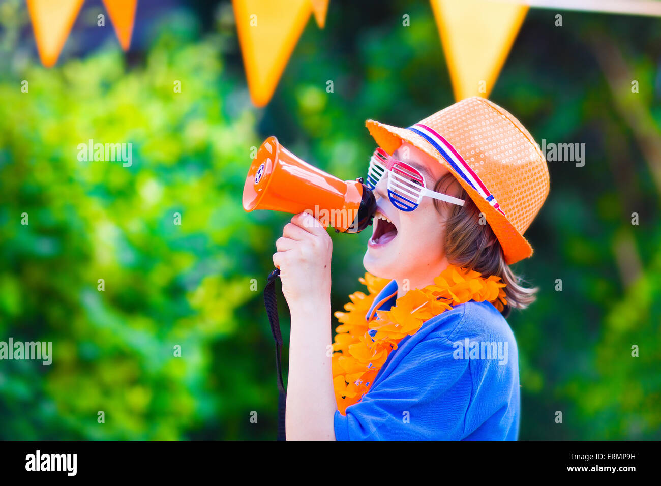 Dutch boy, football fan, cheering and supporting soccer team of ...