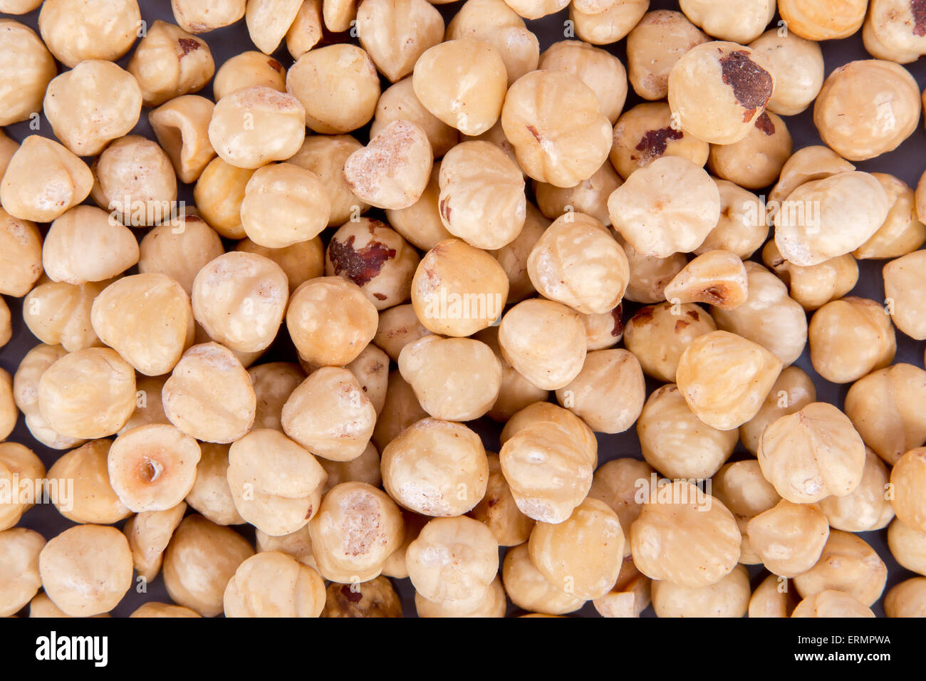 Close up detailed top view of nuts on whole background Stock Photo - Alamy