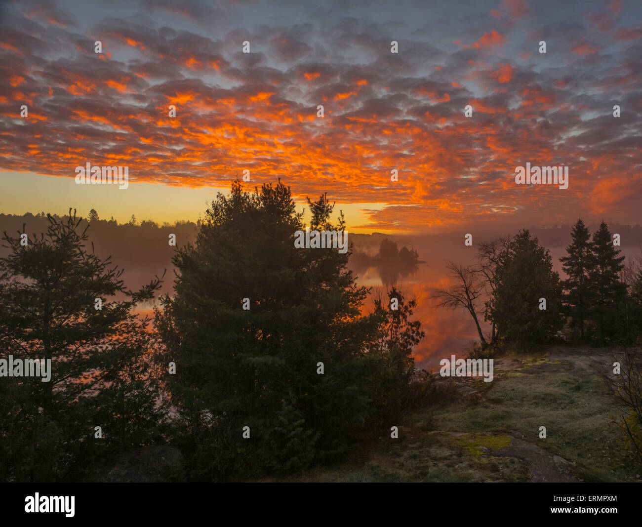 Glowing clouds at sunrise; Ontario, Canada Stock Photo - Alamy