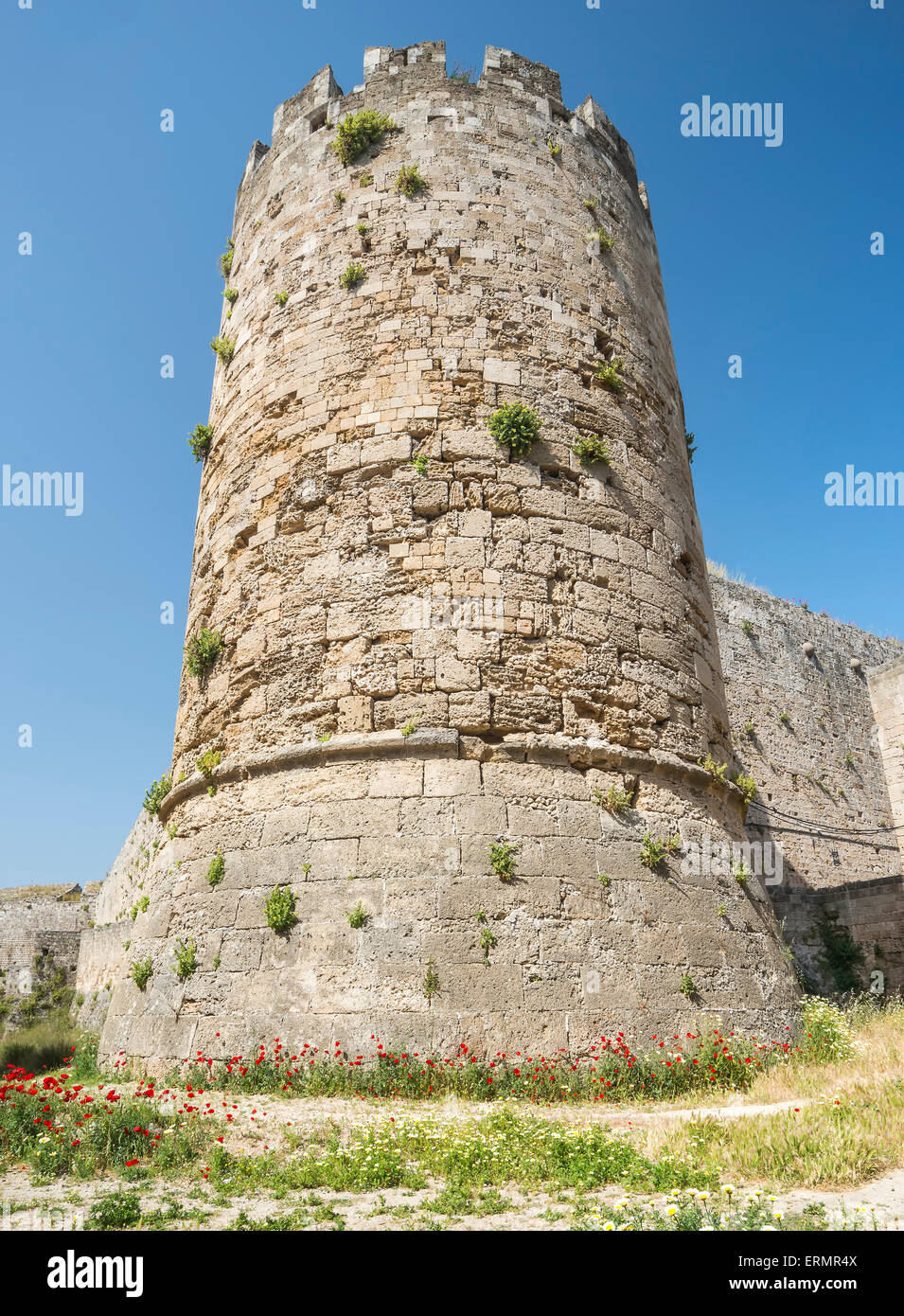 The old medieval castle walls as seen from the moat on the Greek island ...