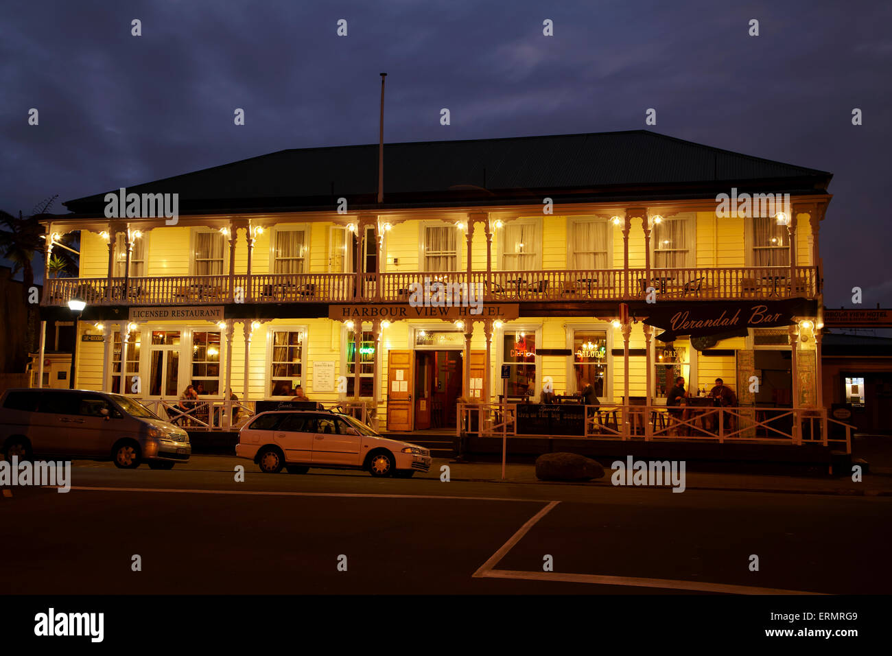 Harbour View Hotel at dusk, Raglan, Waikato, North Island, New Zealand ...