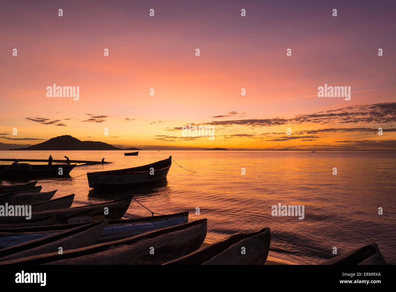 Fishing boats at dusk, Cape Maclear, Lake Malawi; Malawi Stock Photo ...