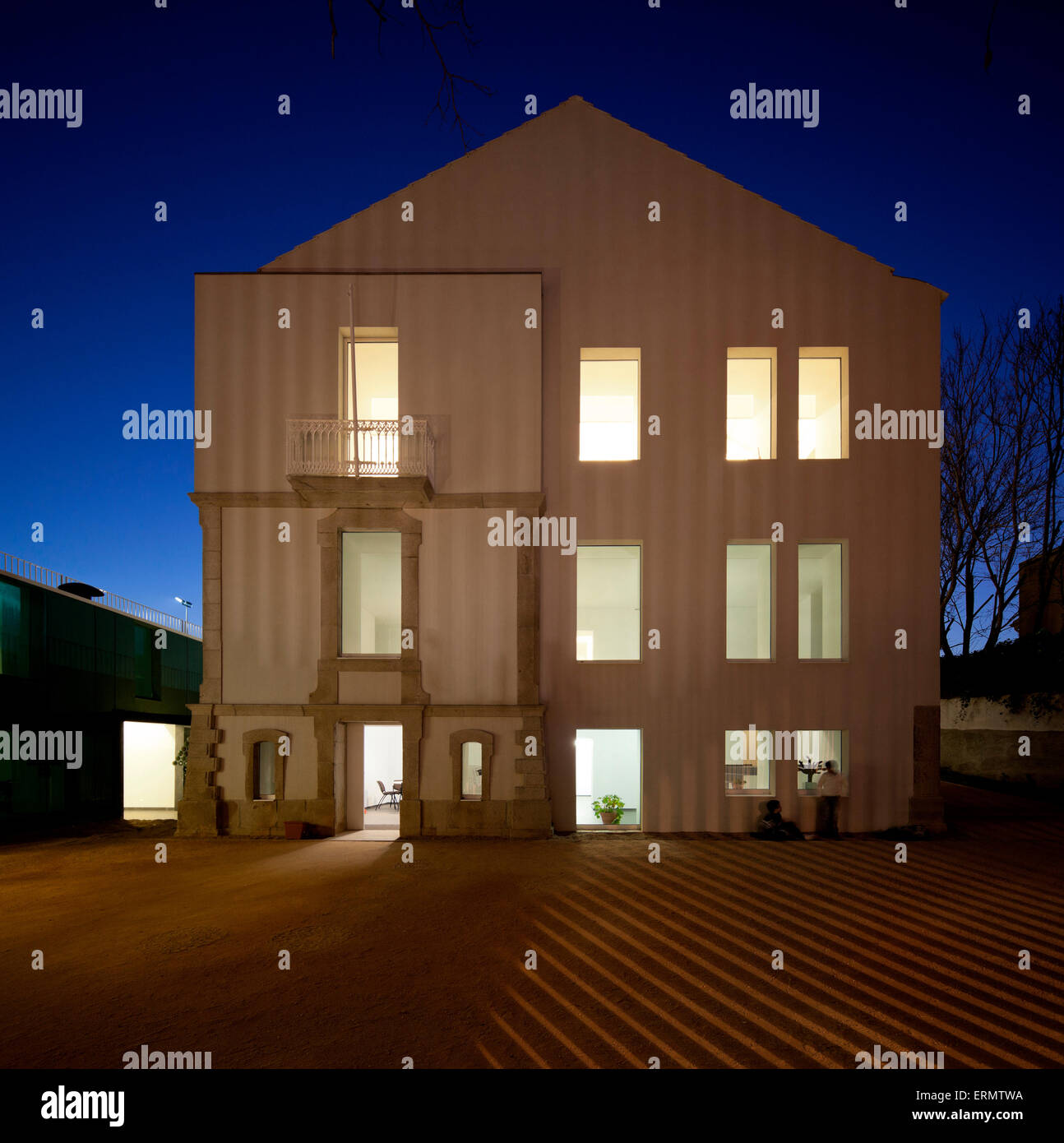 Night elevation of existing school building. Center School S.Miguel de ...