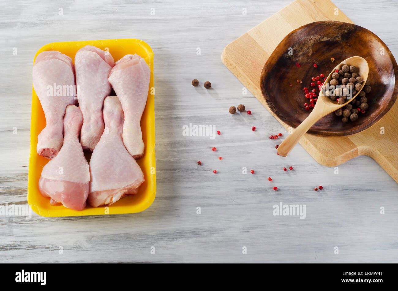 Fresh chicken legs on a tray . Top view Stock Photo - Alamy