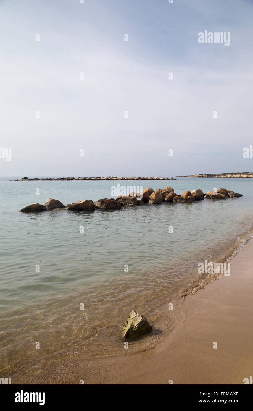 Rocks in the water off the beach; Peyia, Paphos, Cyprus Stock Photo - Alamy