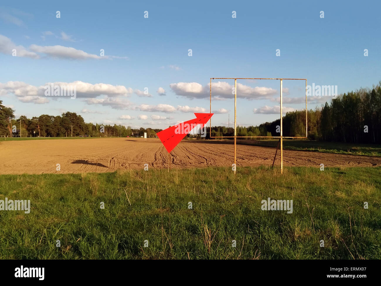 Red arrow sign outdoors Stock Photo - Alamy