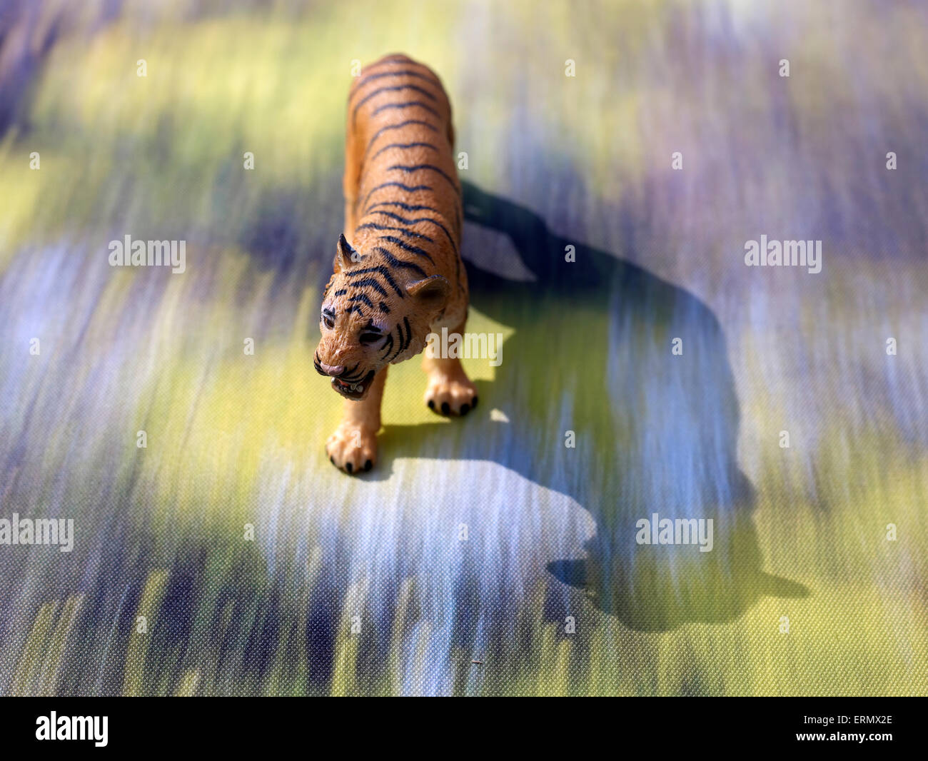 Miniature model of a tiger Stock Photo - Alamy