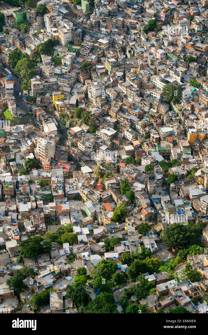 Crowded Brazilian Rocinha favela shanty town climbs a hillside in Rio ...