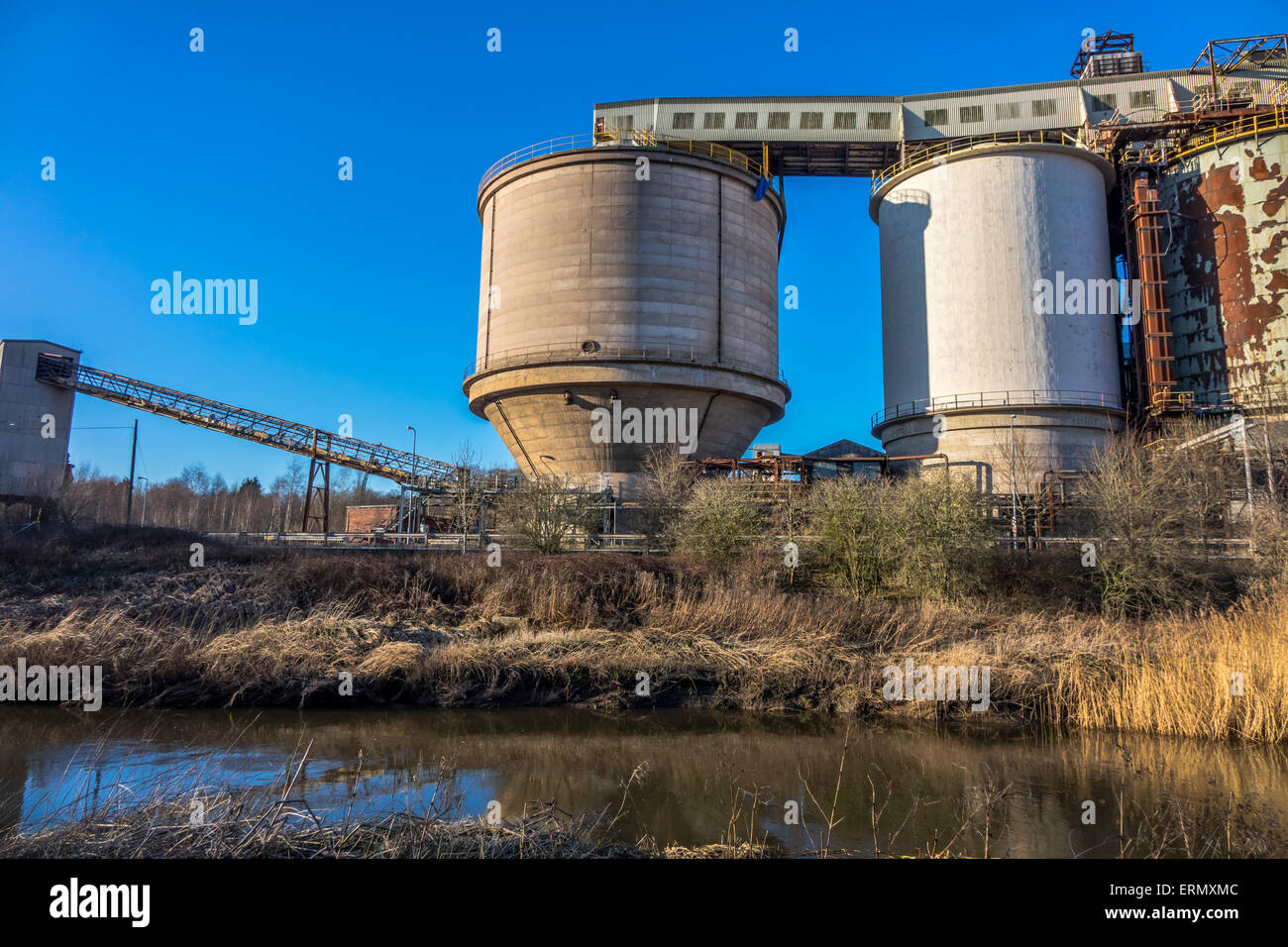 Industrial chemical plant alongside a river. Industrial plant Brunner ...