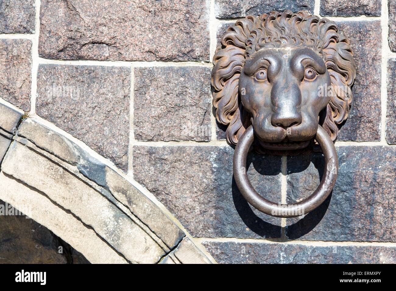 Ornamented Lion Head Handle Made of Brass on Tile Background Stock ...