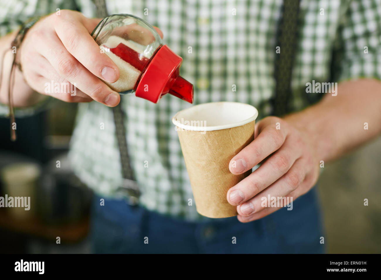 Man hand adding sugar coffee hi-res stock photography and images - Alamy