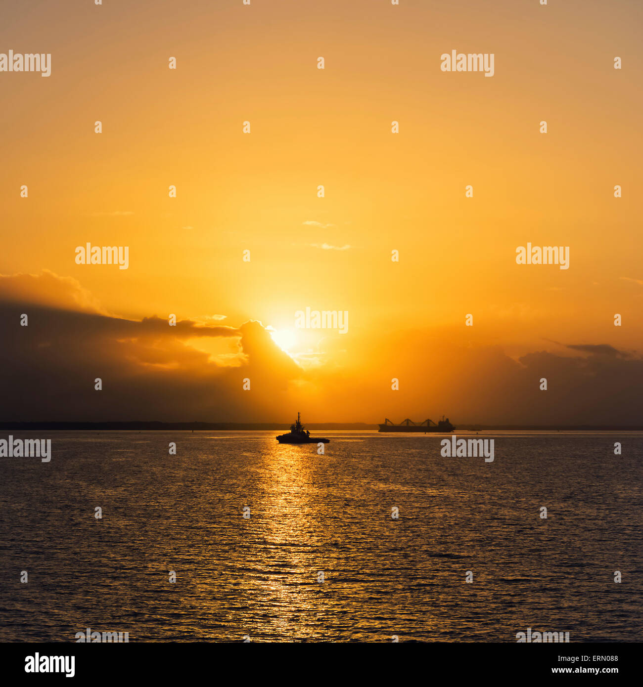 Sunrise in Trinidad and Tobago sea square composition Stock Photo - Alamy