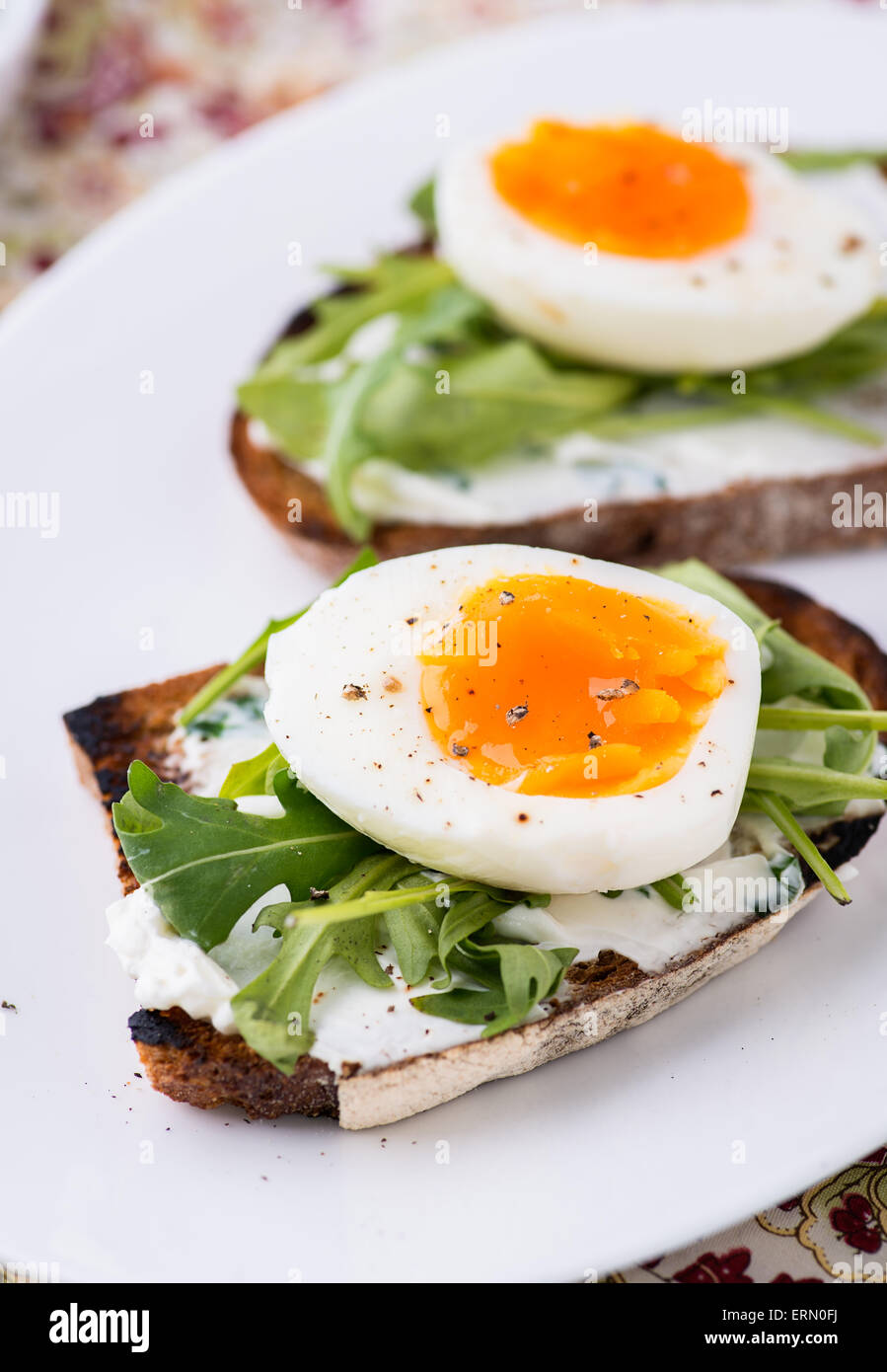 Rye toast sandwiches with egg and soft cheese, selective focus Stock ...