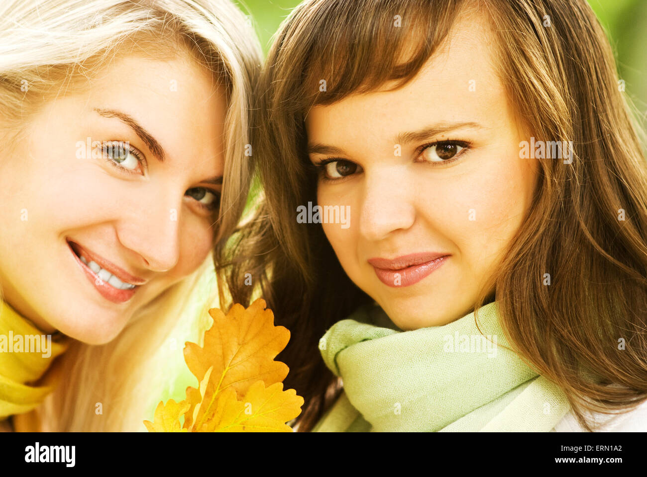 Two beautiful young women outdoors Stock Photo - Alamy