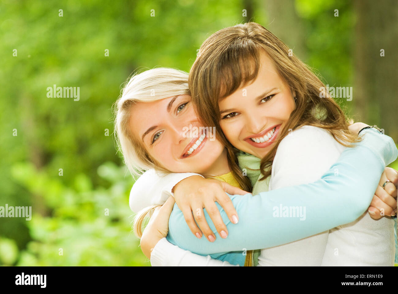 Two beautiful young women outdoors Stock Photo - Alamy