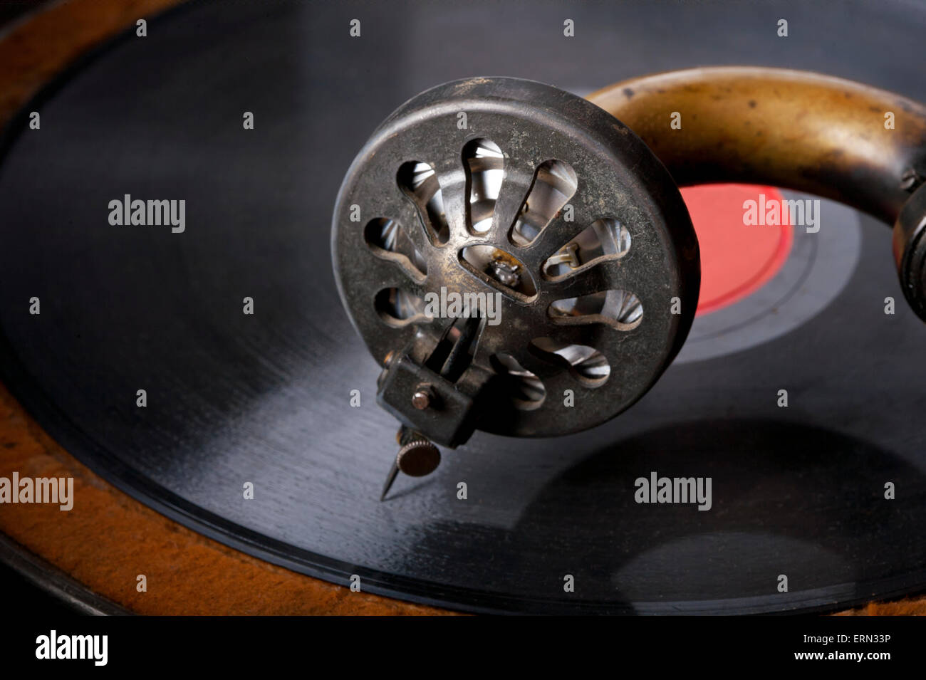 Vintage phonograph needle placed against 78 record giving a nostalgic ...