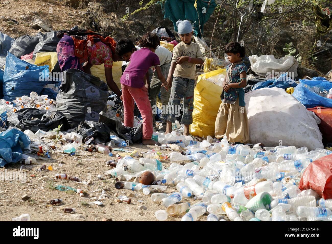 Indian rag pickers scour dumps on World Environment Day. The World ...