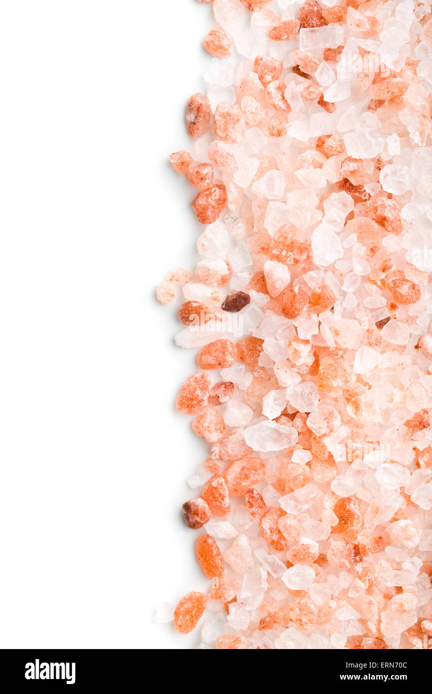 Himalayan salt on white background Stock Photo - Alamy