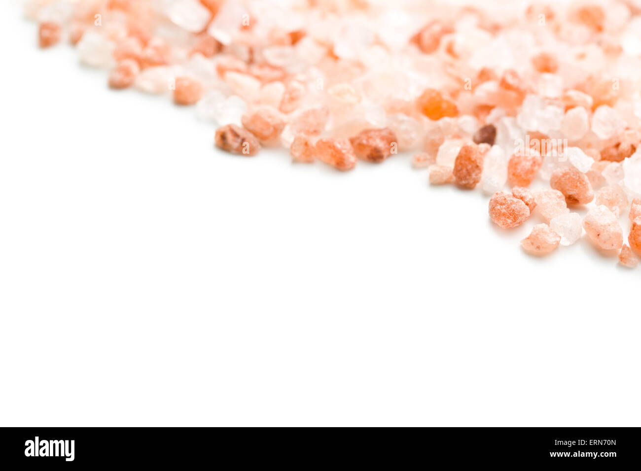 Himalayan salt on white background Stock Photo - Alamy
