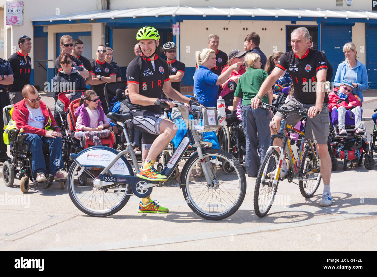 Fireman on bicycle hi-res stock photography and images - Alamy
