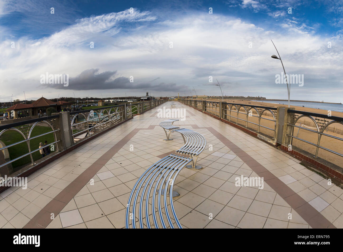 Curved bench on the promenade along the beach and waterfront; South ...