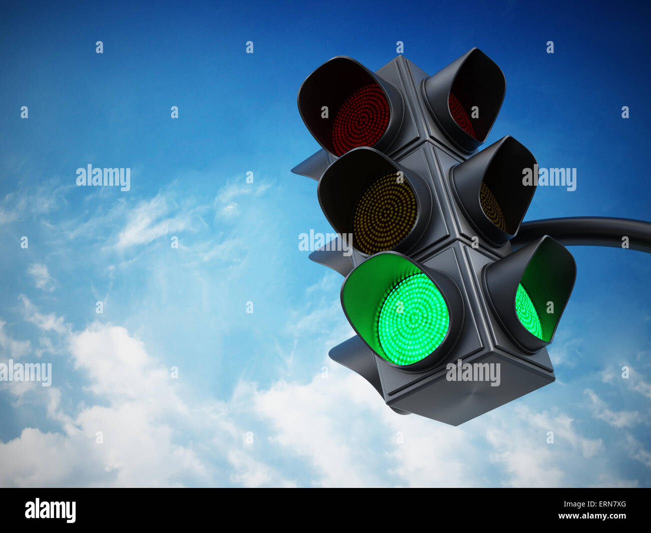 Green traffic light against blue sky Stock Photo - Alamy