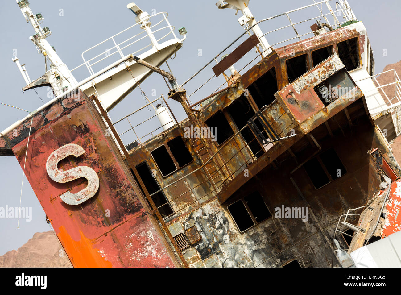 Fire damaged cargo ship. Berthed Aqaba Jordan Middle East Stock Photo ...