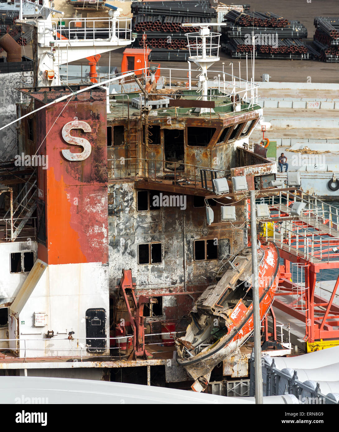 Fire damaged cargo ship. Berthed Aqaba Jordan Middle East Stock Photo ...