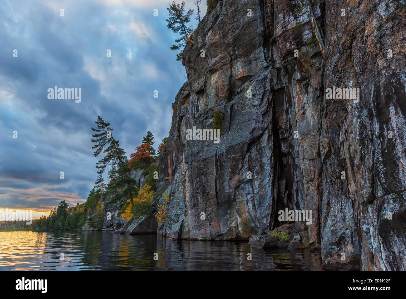The painted cliffs of Rock Lake at sunset in Algonquin Park; Ontario ...