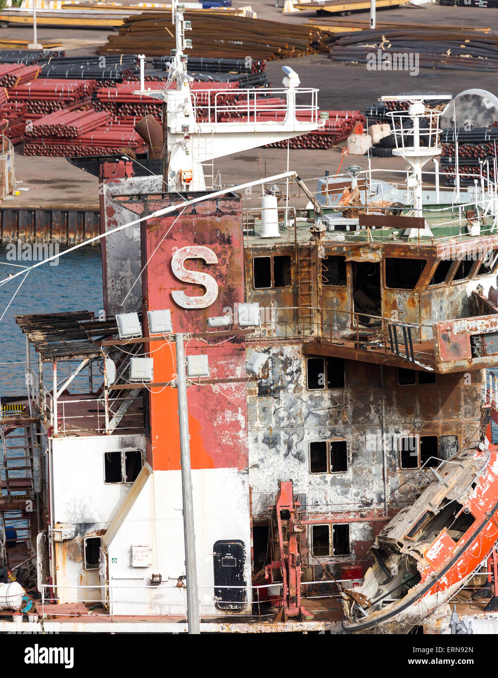 Fire damaged cargo ship. Berthed Aqaba Jordan Middle East Stock Photo ...