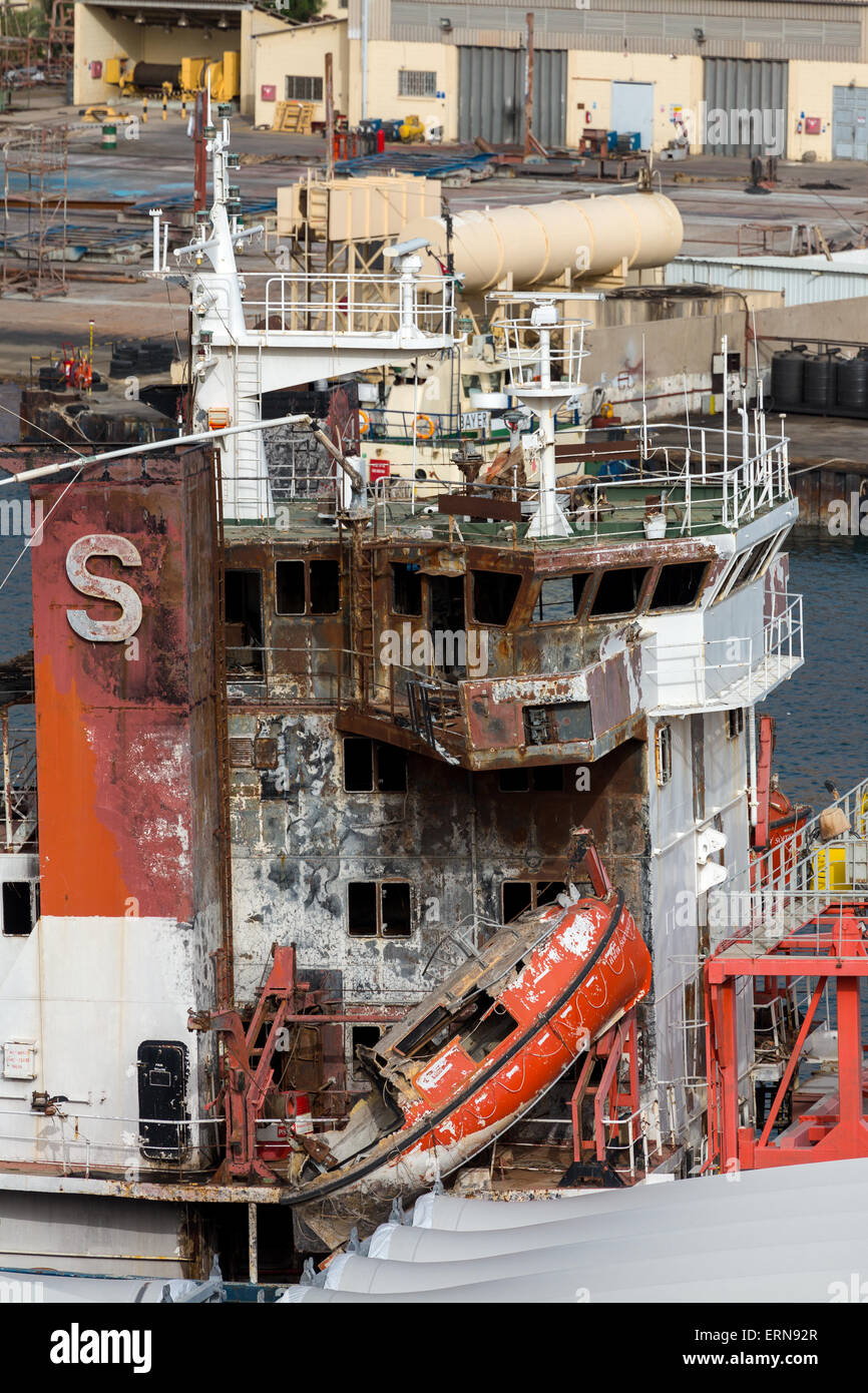 Fire damaged cargo ship. Berthed Aqaba Jordan Middle East Stock Photo ...