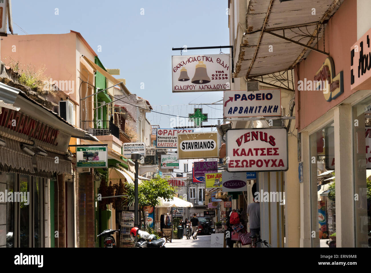 Signs in greek language on the shops in a street in Chios on the isle ...