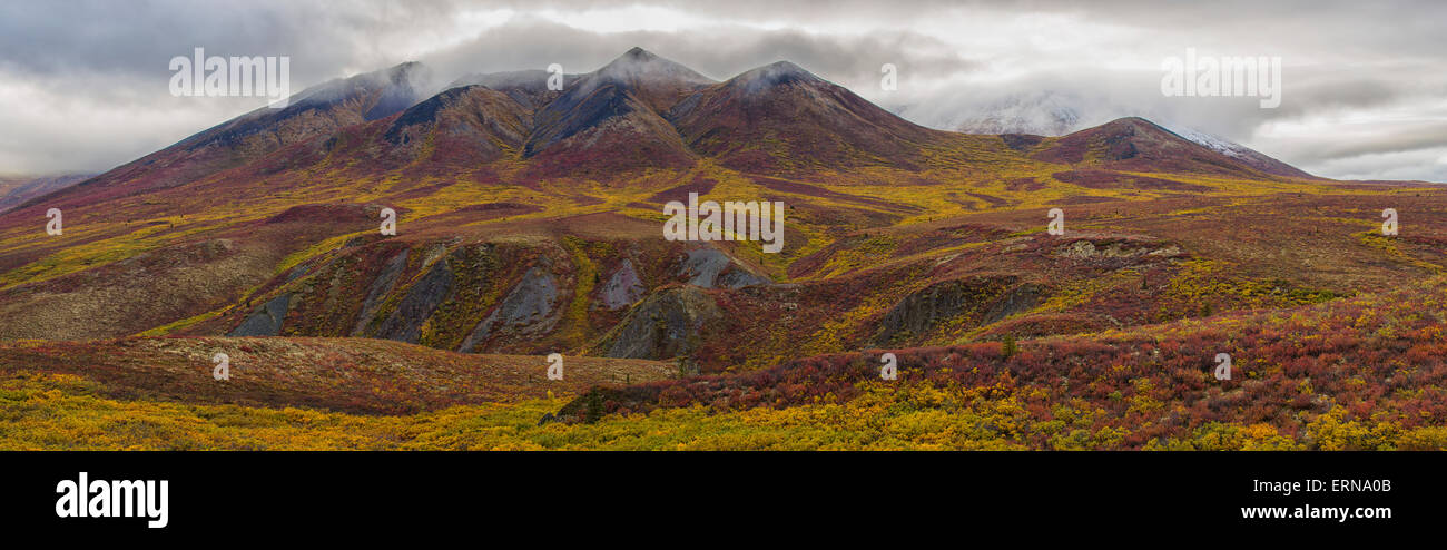 The multi-coloured hills and mountains along the Dempster Highway, near ...