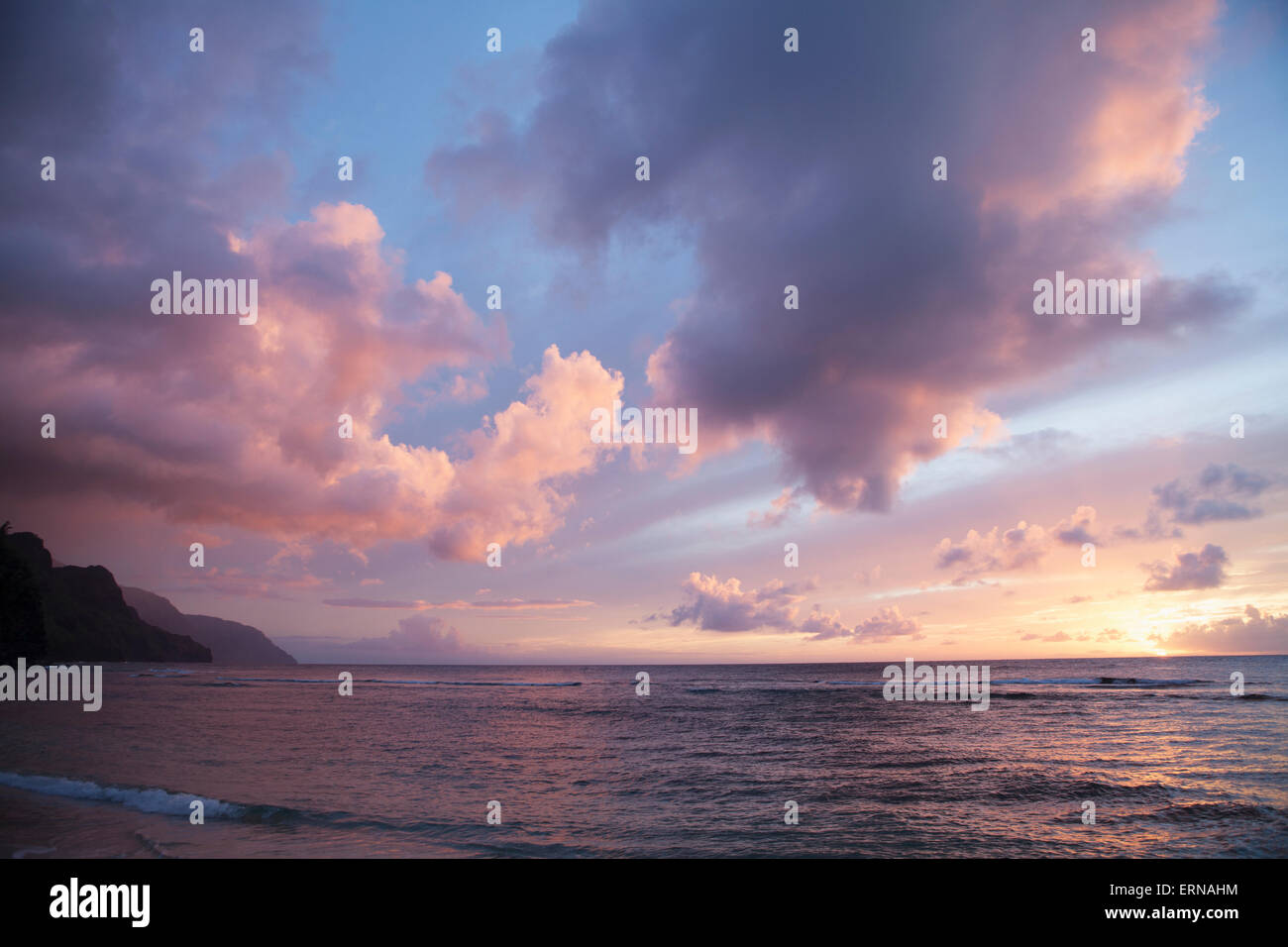Sunset over water, Kee Beach at Haena Beach State Park; Haena, Kauai ...