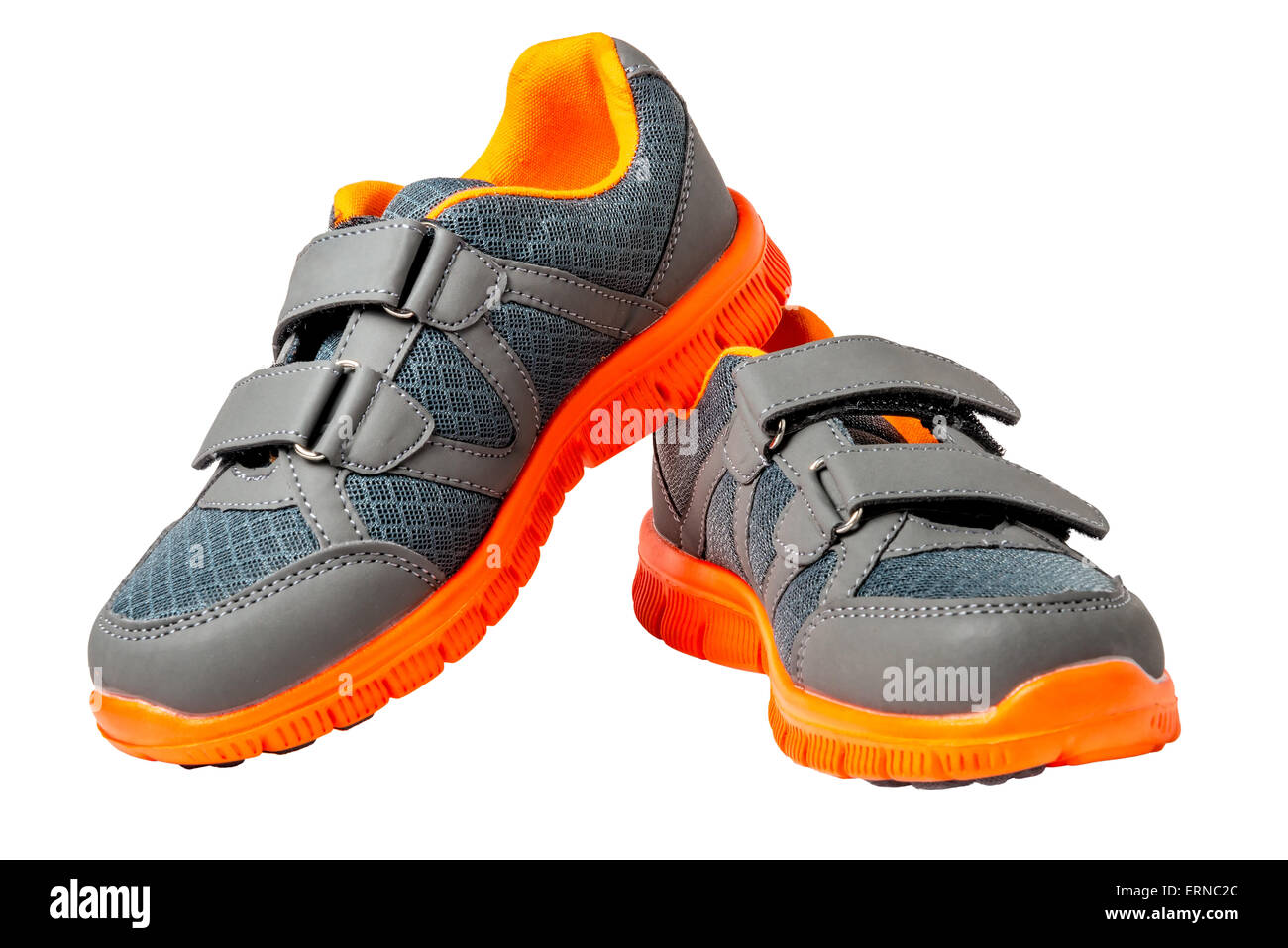 children sneakers with bright orange trim on a white background Stock ...