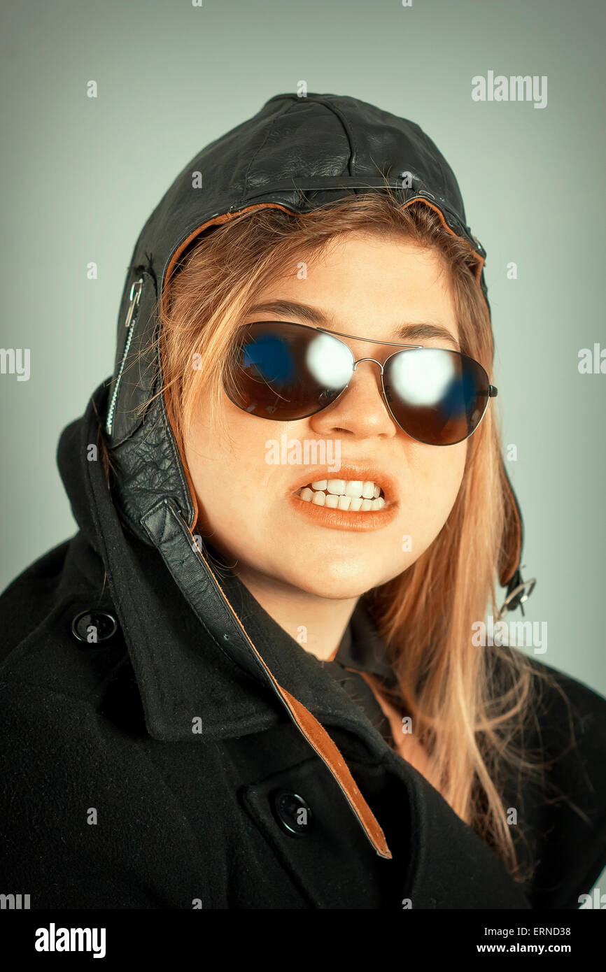 Female aviator pilot with hat and sunglasses cool portrait Stock Photo ...