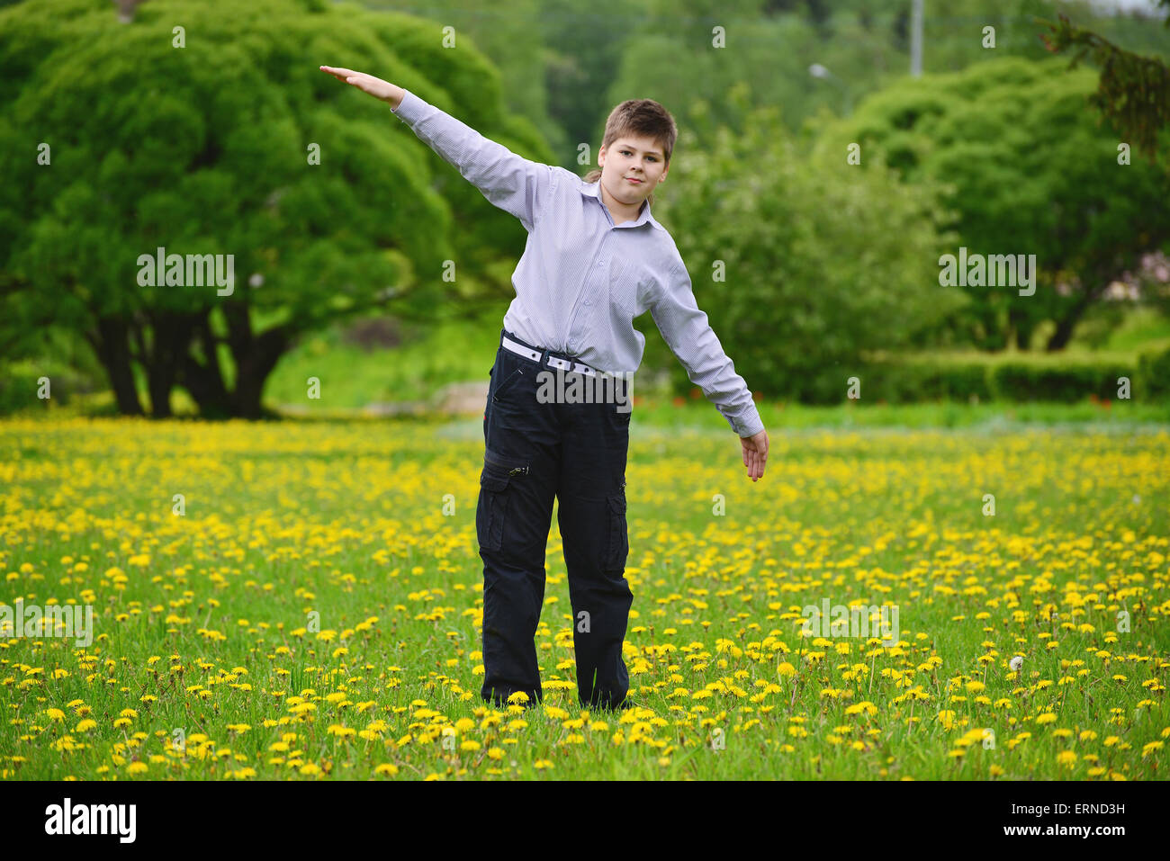 A teenager Boy in the spring park Stock Photo - Alamy