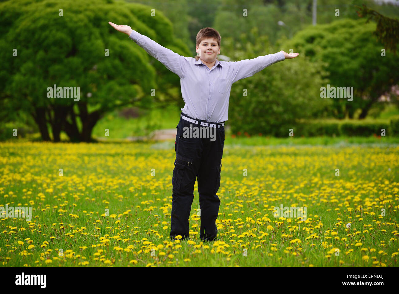 A teenager Boy in the spring park Stock Photo - Alamy