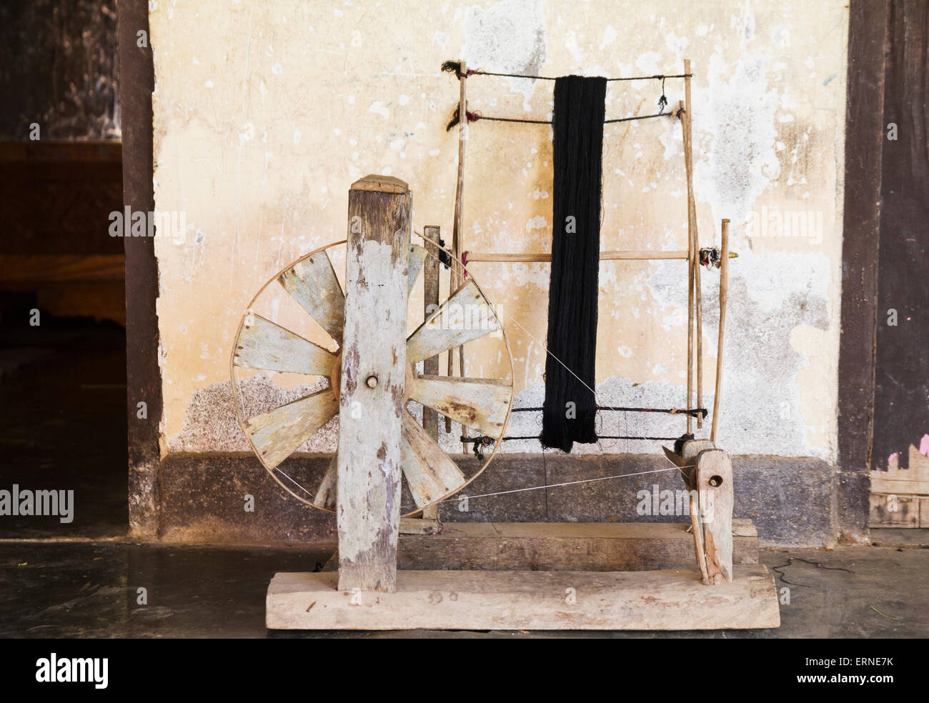 Spinning wheel at the home of a weaver, Sidemen, Bali, Indonesia Stock ...