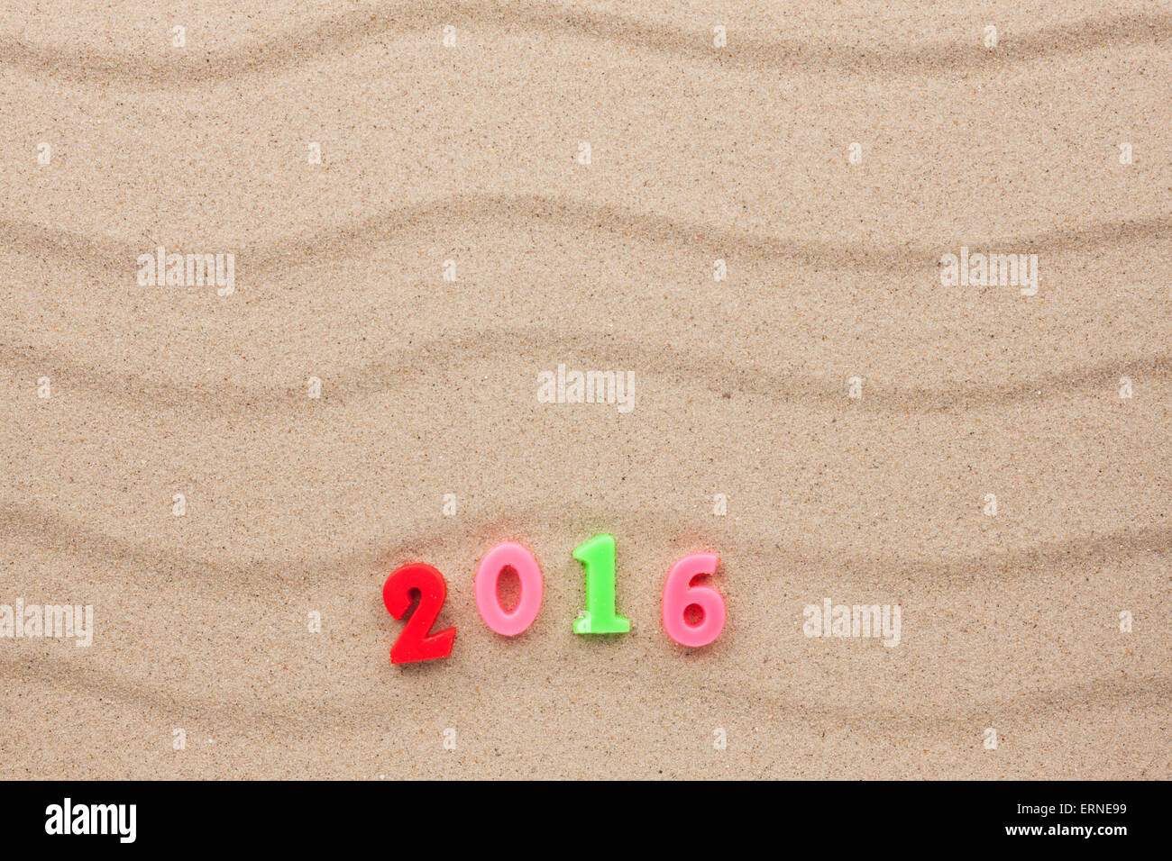 New year 2016 written in the sand, with space for your text Stock Photo ...