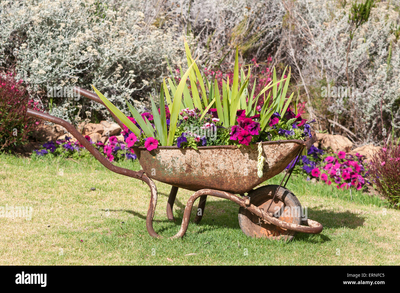 Old Wheelbarrow With Flowers 24 Unique Repurposed Planters Made From